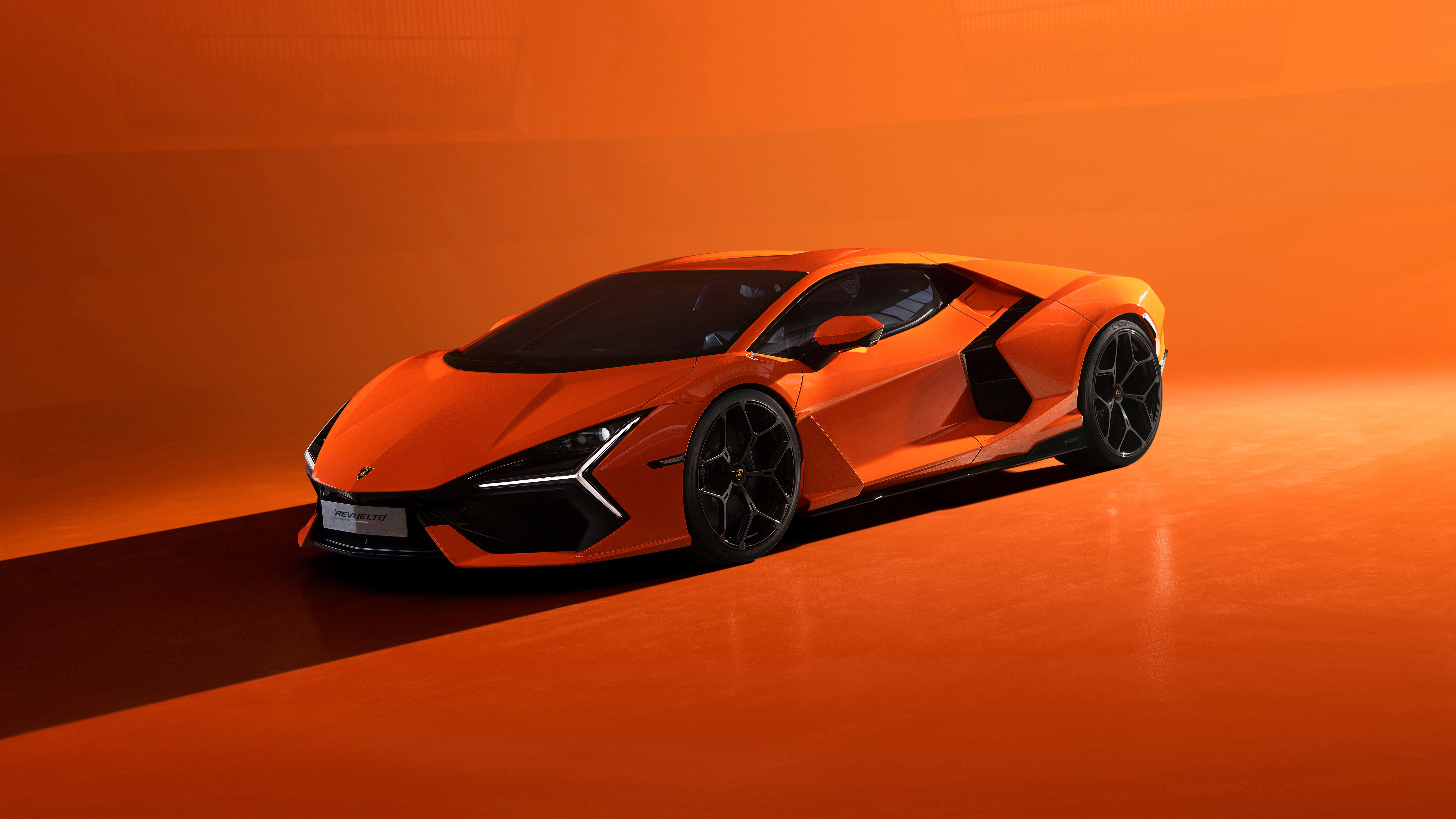 Lamborghini Revuelto Orange Hypercar Side Views 4K & 5K Wallpaper