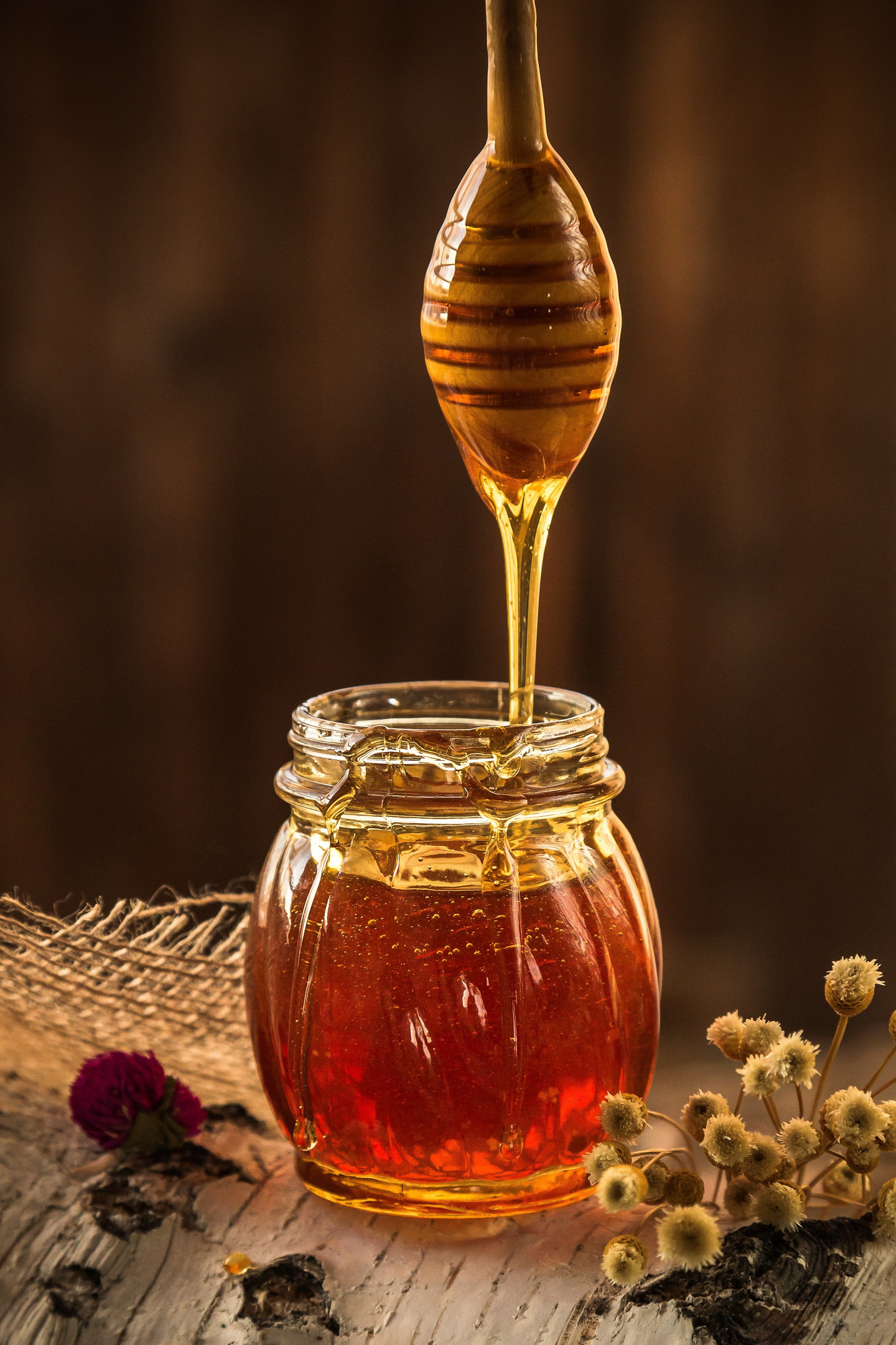 Jar Of Golden Honey On Rustic Table Mobile Wallpaper | PixieWall